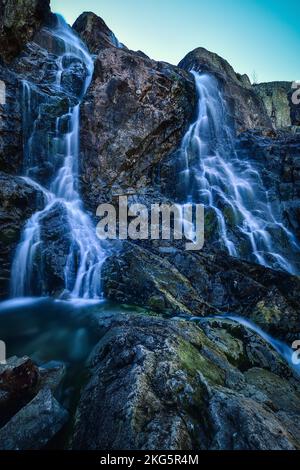 Beautiful waterfall with blurred water effect. Photo taken in the ...
