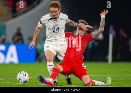Joe Rodon of Wales and Josh Sargent of USA during the Qatar 2022 World ...