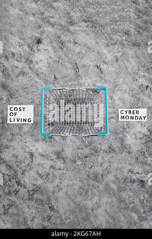 Cost of Living vs Cyber Monday conceptual image with graphs showing ...