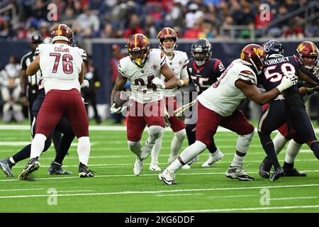 Washington Commanders guard Sam Cosmi (76) looks on before an NFL ...