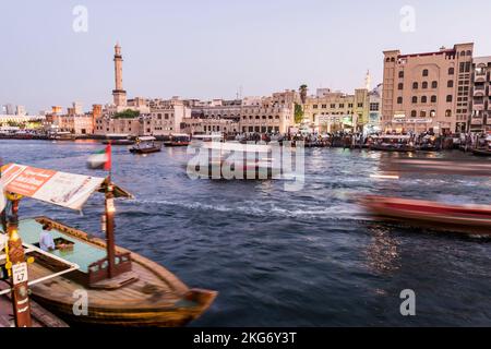 Scenic view of traditional arab abra-boat on turquoise water of Madinat ...