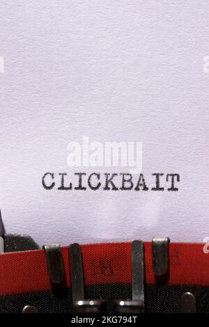 Clickbait word written with a typewriter Stock Photo - Alamy