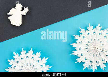 Volumetric paper snowflake on a colored background, flat lay Stock ...