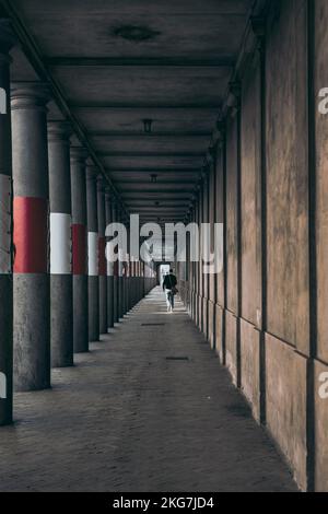 pedestrian passageway with concrete columns Stock Photo - Alamy