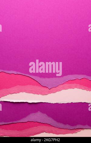 Ripped up pieces of coloured paper with copy space Stock Photo - Alamy