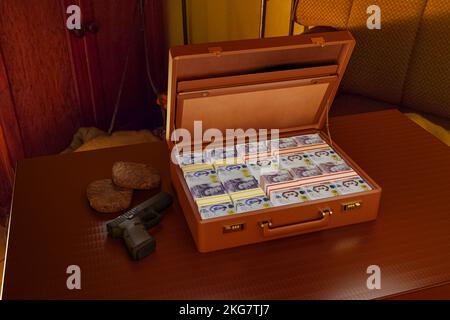 a briefcase full of money with a gun and some drugs in it (replics gun ...