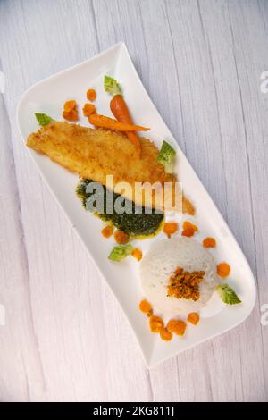 Recipe for Hake fillet breaded with panko, rice, carrot chips and ...