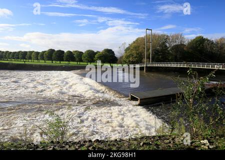 The river Taff at Blackweir after heavy rain. White water at the weir ...