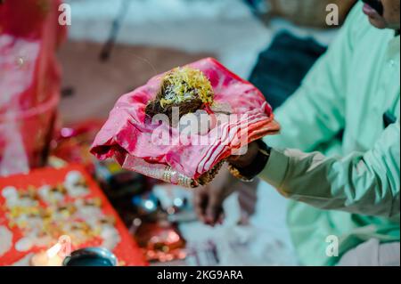 Indian rituals on an auspicious day to perform pooja by placing coconut ...