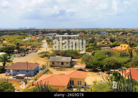 View looking out over Aruba from the top of a large Rock Formation ...