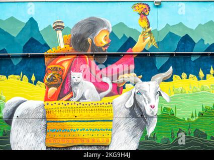 Mural by Devak depicting men riding a tiger and a goat, Turkish history ...