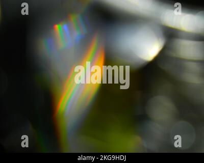 The long exposure view of glowing particles shining in the darkness ...