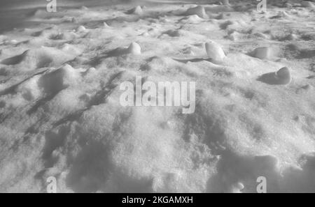 Snow texture, snowdrifts under sunlight with shadows Stock Photo - Alamy