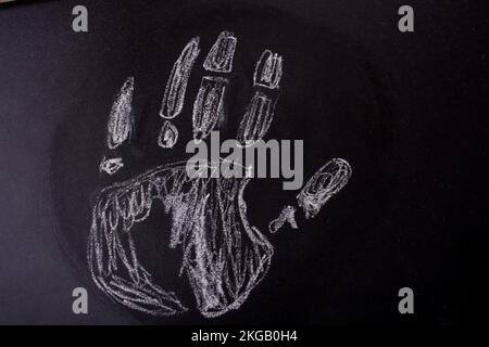 Handprint drawn by white chalk on a blackboard Stock Photo - Alamy