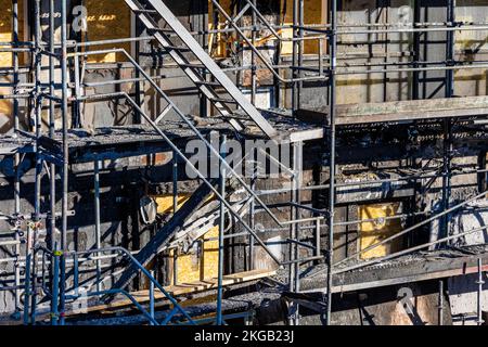 Burnt insulation during the construction of a new apartment building ...