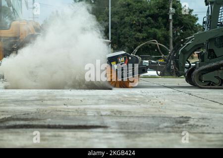 Members of the Naval Mobile Construction Battalion-10 (Seabees) and ...