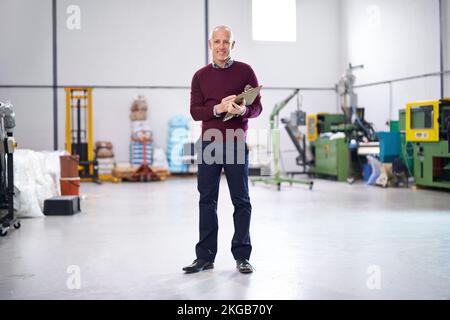 Everything seems to be in order. a confident mature male doctor ...