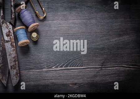 Antique rusty scissors spools of thread thimble clasp pin copyspace ...