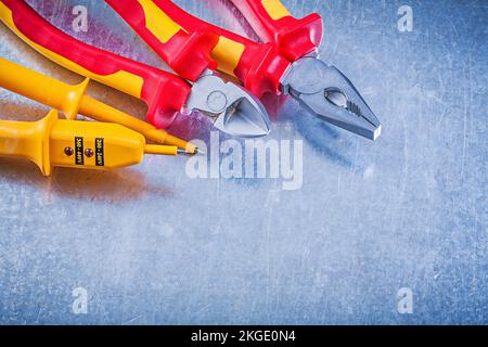 Electric tester pliers nippers on metallic background electricity ...