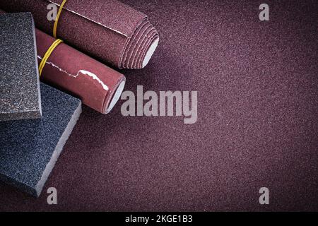 Emery paper rolls sanding sponges on polishing sheet abrasive materials ...