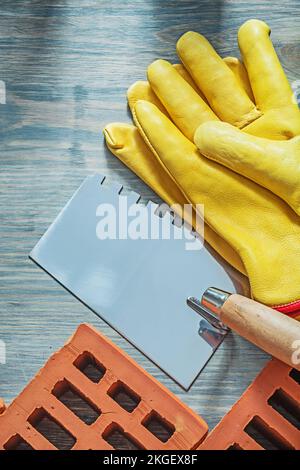 Red bricks safety gloves bricklaying trowel building concept Stock ...
