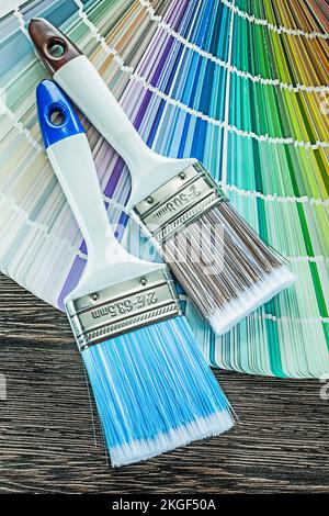 Color sampler fan on wooden board Stock Photo - Alamy