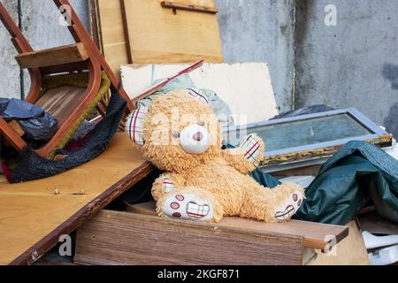 Stuffed bear toy thrown into a landfill close up Stock Photo - Alamy