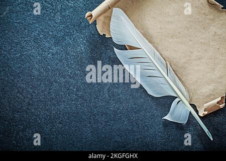 Vintage paper plume on black background Stock Photo - Alamy