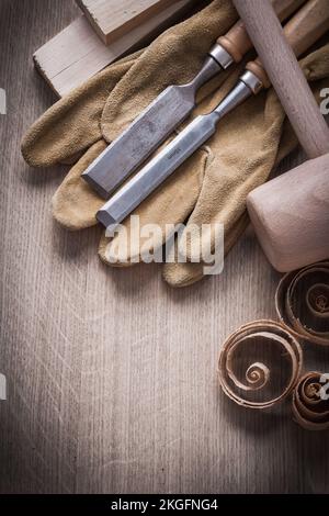 Firmer chisel working gloves on wooden board Stock Photo - Alamy