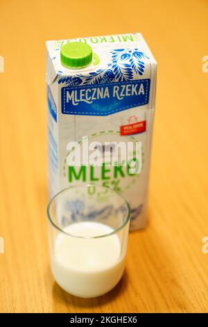 A vertical shot of Polish Mleczna Rzeka brand milk with half percent ...