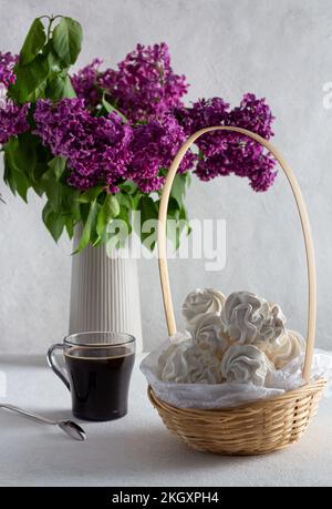 Marshmallows on plate on light background Stock Photo - Alamy