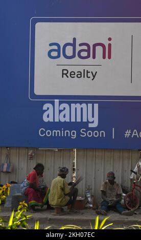 Adani logo is seen on a poster in Mumbai. Adani group is a diversified ...
