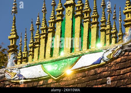 Roof topped with traditional Dok so faa, decorated with bright green ...
