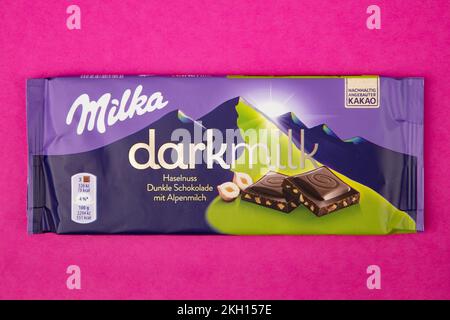 WETZLAR; GERMANY - 2022-04-11: Milka chocolate bar on purple background ...