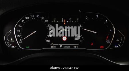 Close up shot with the digital car dashboard. Illuminated car dashboard ...