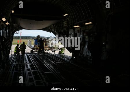 A joint precision airdrop system bundle is deployed from a U.S. Air ...