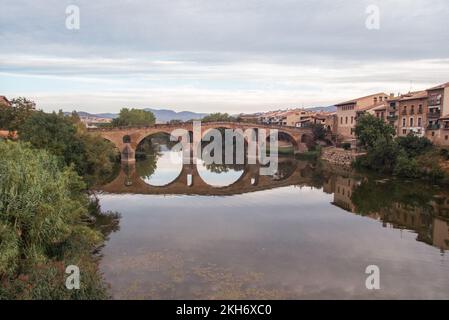 The important bridge across the river Arga, build in medieval times at ...