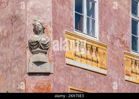 Statue of Roman moon goddess Luna holding a torch, wearing a billowing ...