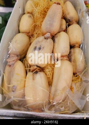 a box of fresh white lotus rhizome roots vegetable Stock Photo - Alamy