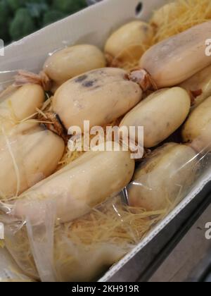 a box of fresh white lotus rhizome roots vegetable Stock Photo - Alamy