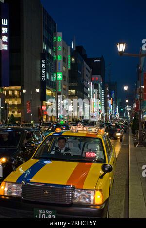 Taxis traffic dusk Ginza Tokyo Japan 2 Stock Photo - Alamy