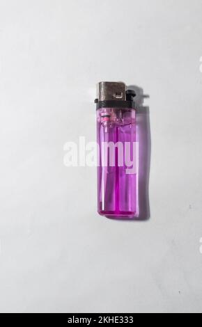 Purple lighter with white background for clipping Stock Photo - Alamy