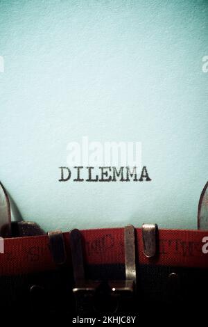 Dilemma word written with a typewriter Stock Photo - Alamy