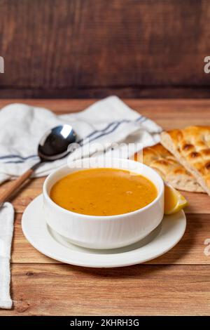 Lentil soup on wood floor. Turkish cuisine delicacies. local name ezo ...
