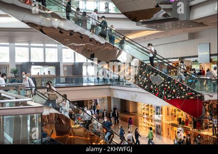 November 16, 2022, Hong Kong, China: Shoppers walk past Christmas tree ...