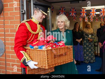 The Queen Consort, with her equerry Captain Edwards Andersen, arrives ...