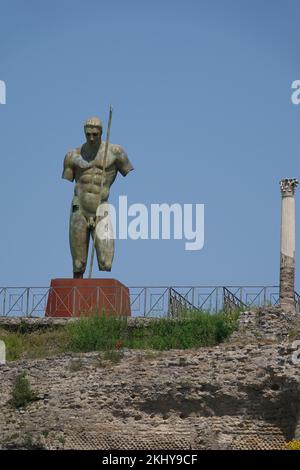 Daedalus statue by Igor Mitoraj overlooking the archeollogical site of ...