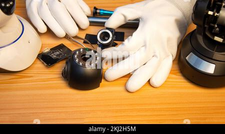 Remove the ip camera to repair cctv Stock Photo - Alamy
