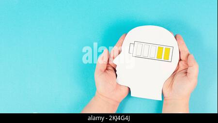 Head with a weakly charged battery, burnout syndrome, stress and ...