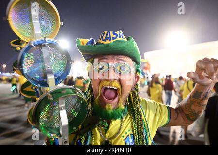 A Brazil fan cheers for his team outside of Lincoln Financial Field ...